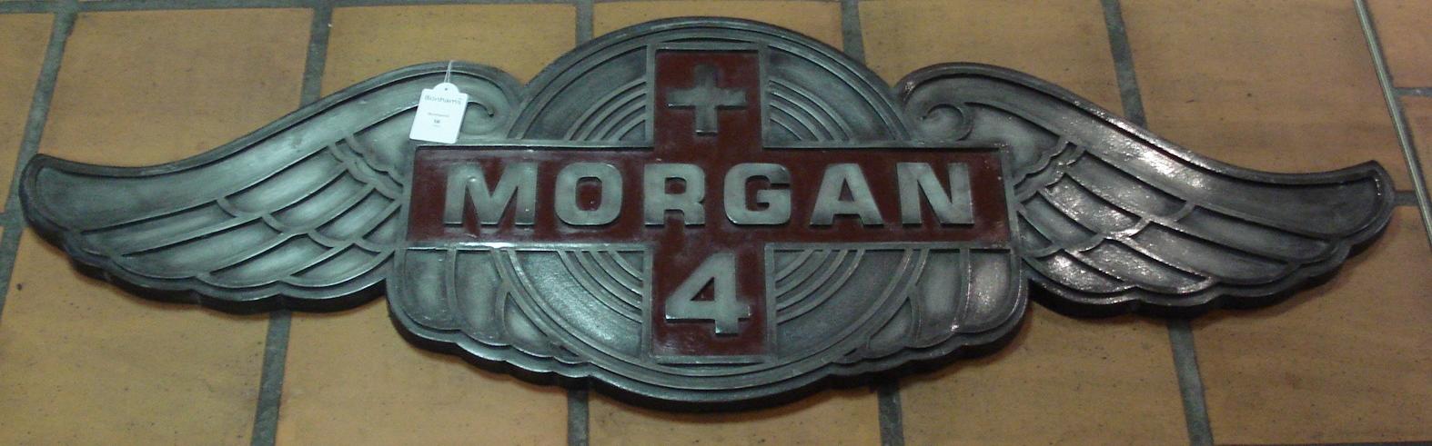 Bonhams Cars : A cold-cast composite Morgan Plus 4 badge,