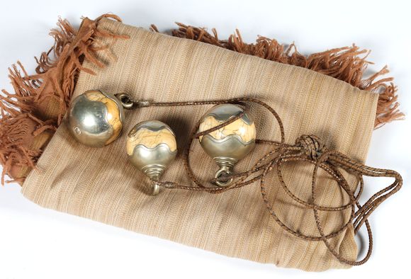 Bonhams : A set of Gaucho bolas, and a textile, Argentina 2