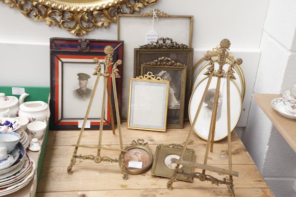 Bonhams : A collection of gilt metal photograph frames,including two ...