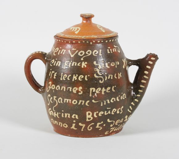 Bonhams : A Dutch slipware coffee pot and associated cover Dated 1765