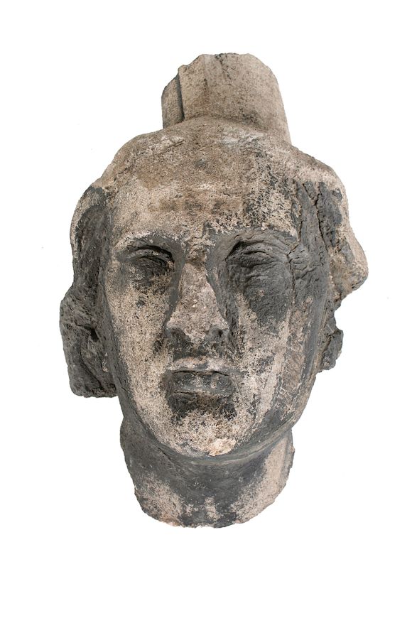 Bonhams : A carved stone headfrom an architectural setting