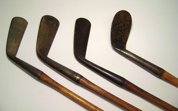 Bonhams : A small collection of 4 smooth faced irons