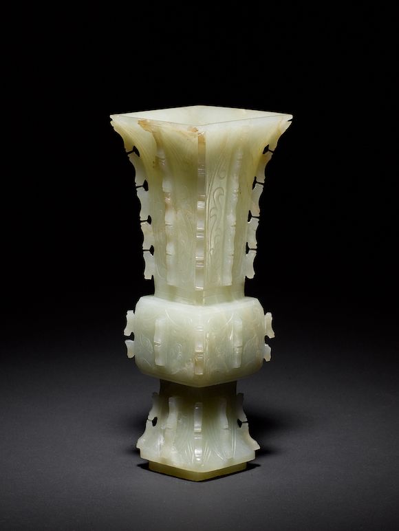 Bonhams : A semi-translucent, pale celadon jade vase of archaic hu or ...