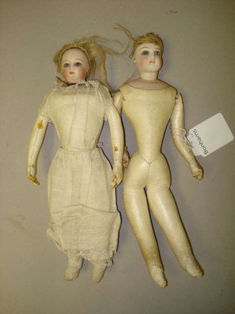Bonhams : Two bisque shoulder head fashion dolls