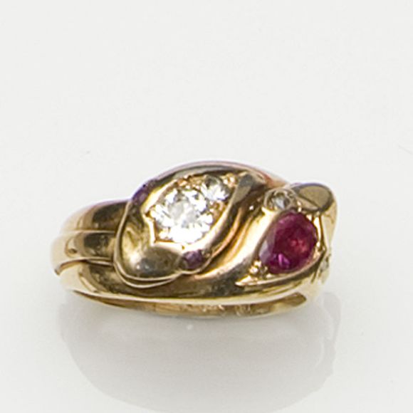 Bonhams : A ruby and diamond set double headed serpent ring