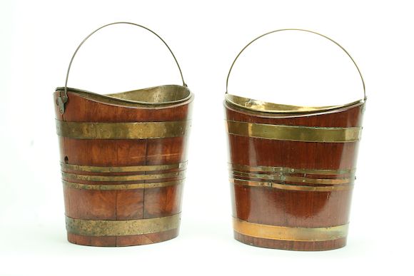 Bonhams : A near pair of George III brass bound elliptical scrap buckets