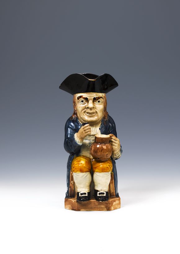 Bonhams : A rare Staffordshire 'Long Face' Toby jug Circa 1785.