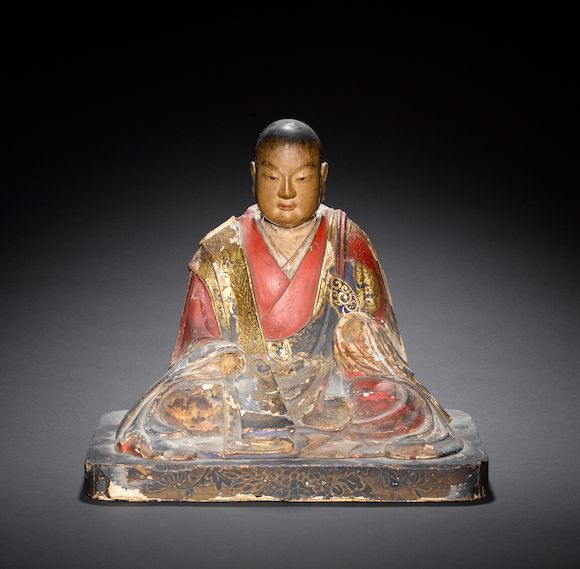 Bonhams : A painted-wood, portrait sculpture of a seated figure with ...
