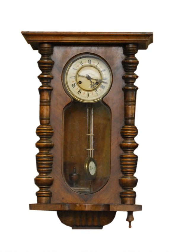 Bonhams : A late 19th century walnut-cased spring driven Vienna wall clock