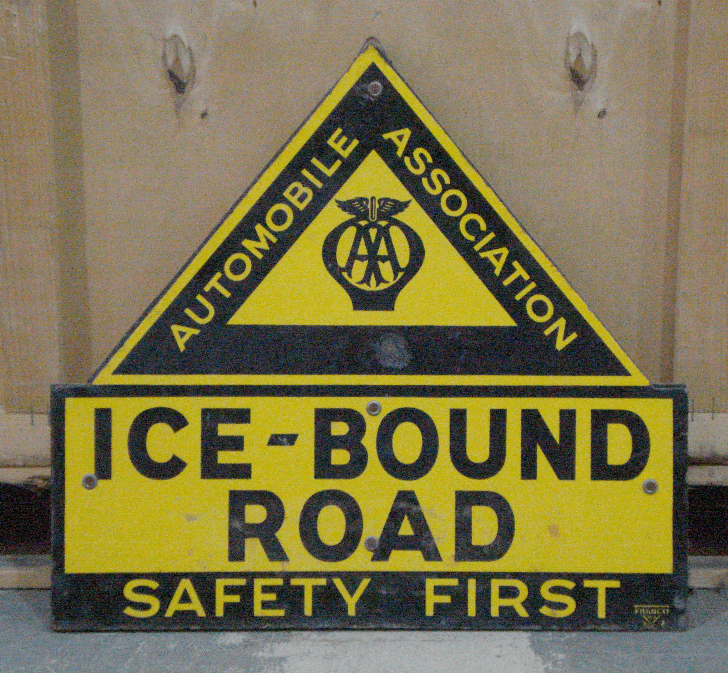 Bonhams Cars : An 'AA - Ice-Bound Road' shaped enamel sign,