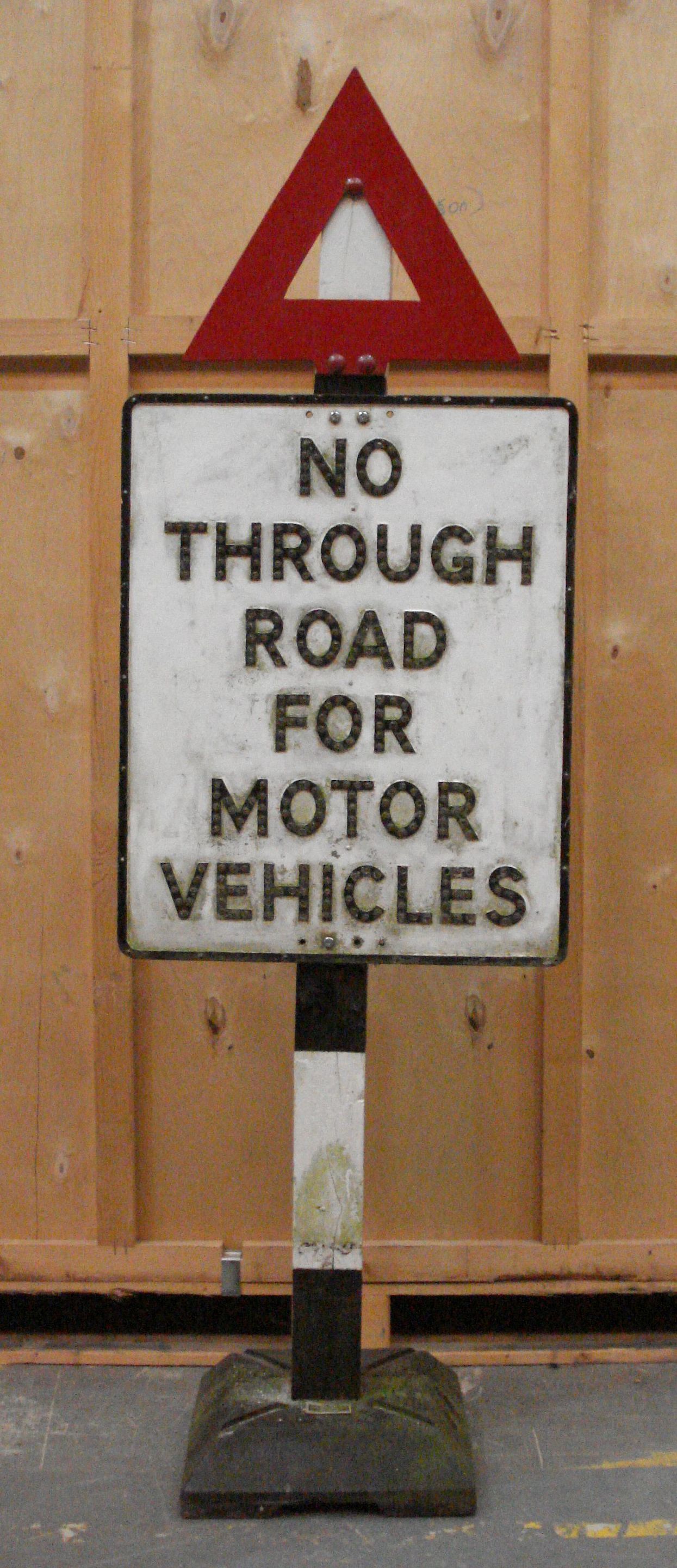 Bonhams Cars : A 'No Through Road For Motor Vehicles' cast alloy road sign,