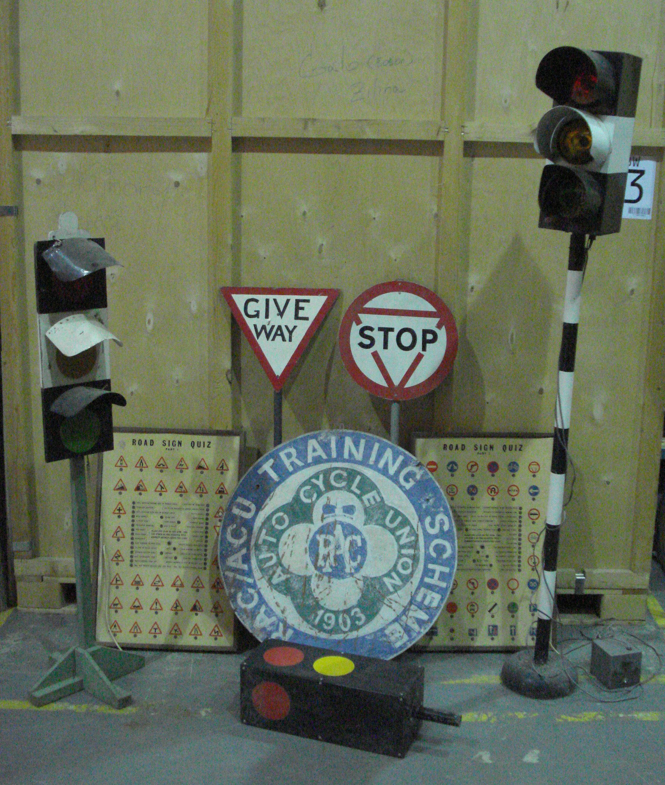 Bonhams Cars : Eight Driving School instructional aids and signs,