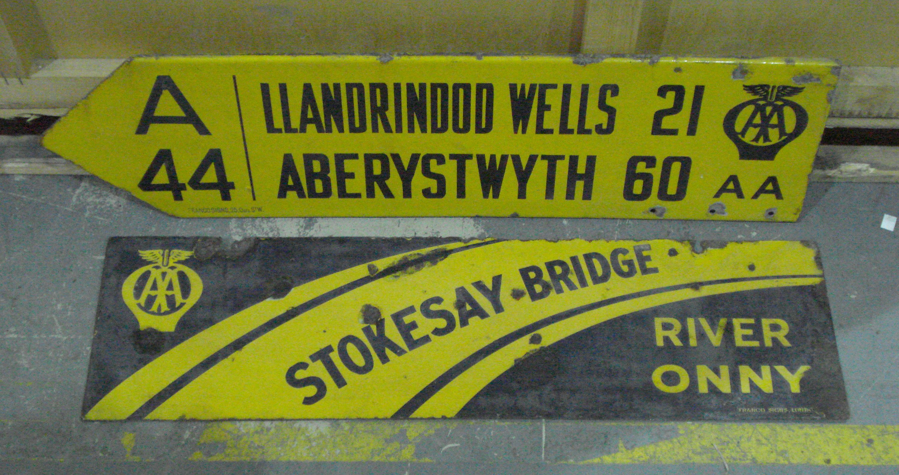 Bonhams Cars : Two AA enamel route marker signs,