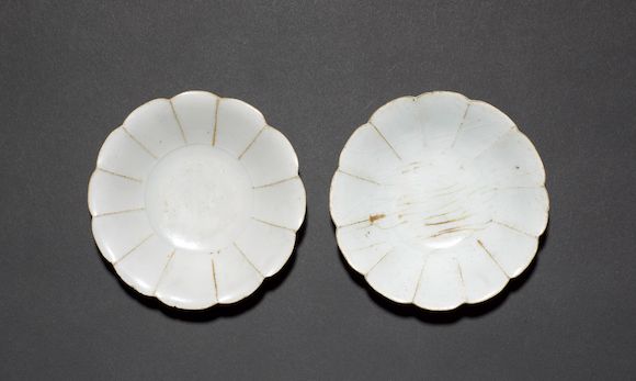 Bonhams : A pair of small Yingqing/Qingbai glazed saucer dishes of ...