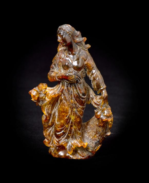 Bonhams : A 17th century carved amber figure of a female Saint ...
