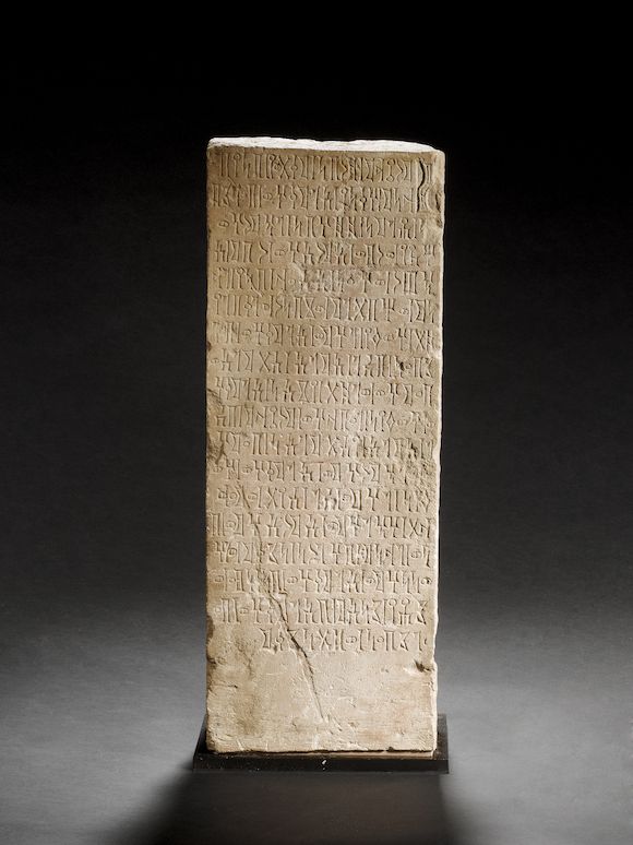 Bonhams : A South Arabian limestone inscribed pillar stele