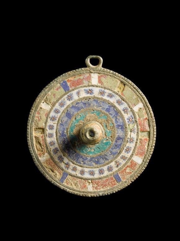 Bonhams : A Roman enamelled bronze disc brooch