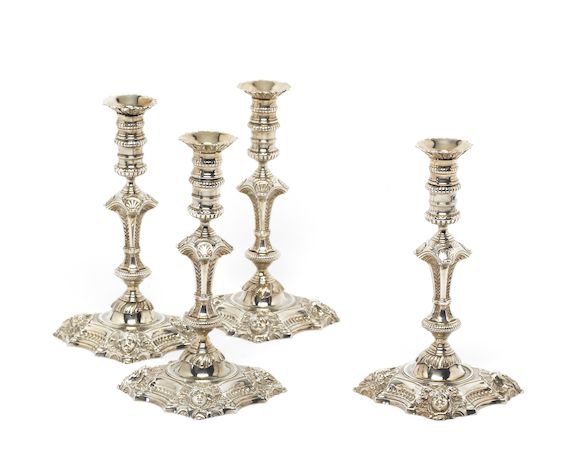 Bonhams : A set of four George II silver cast candlesticks, by George ...