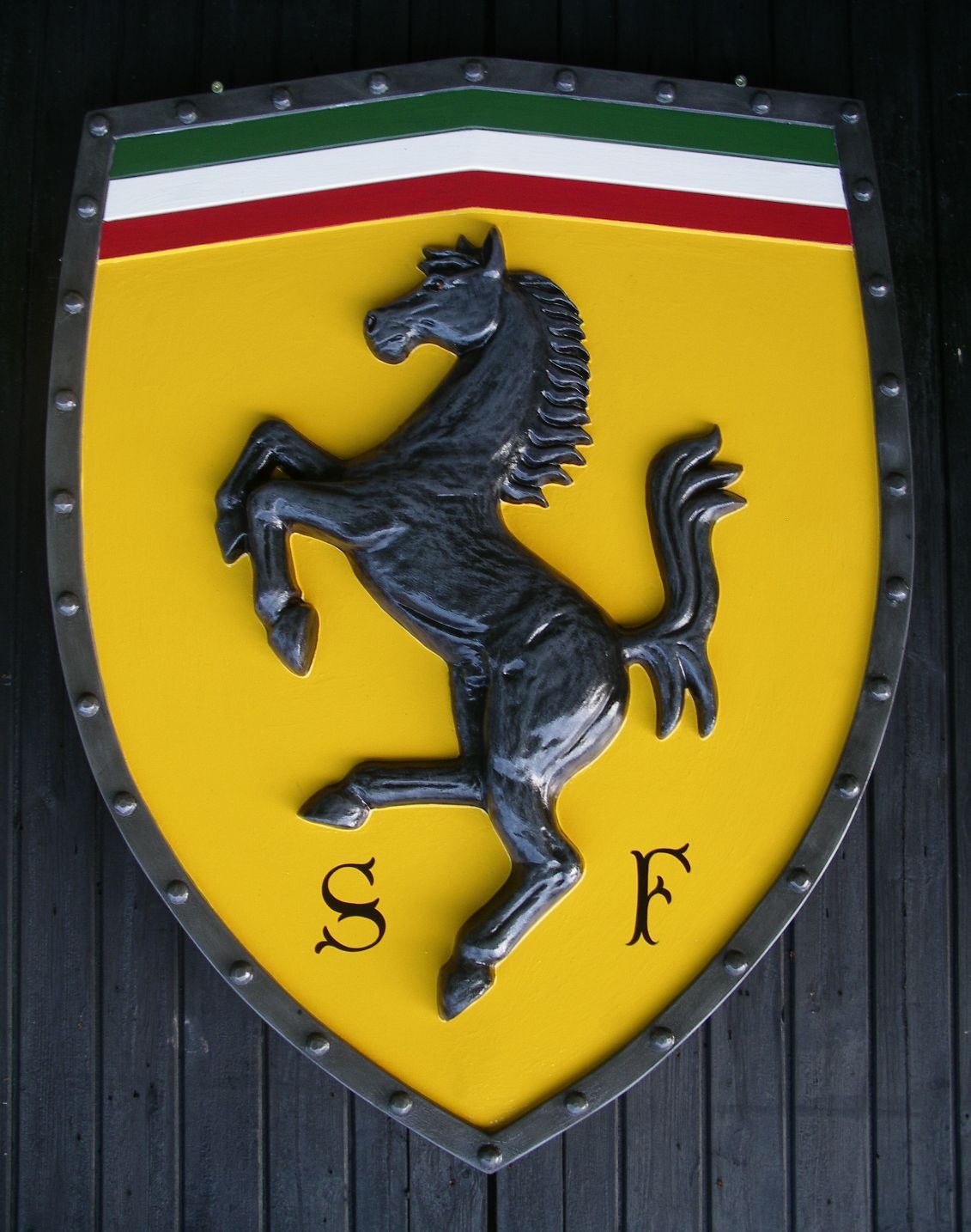 Bonhams Cars : A hand painted Ferrari display shield,
