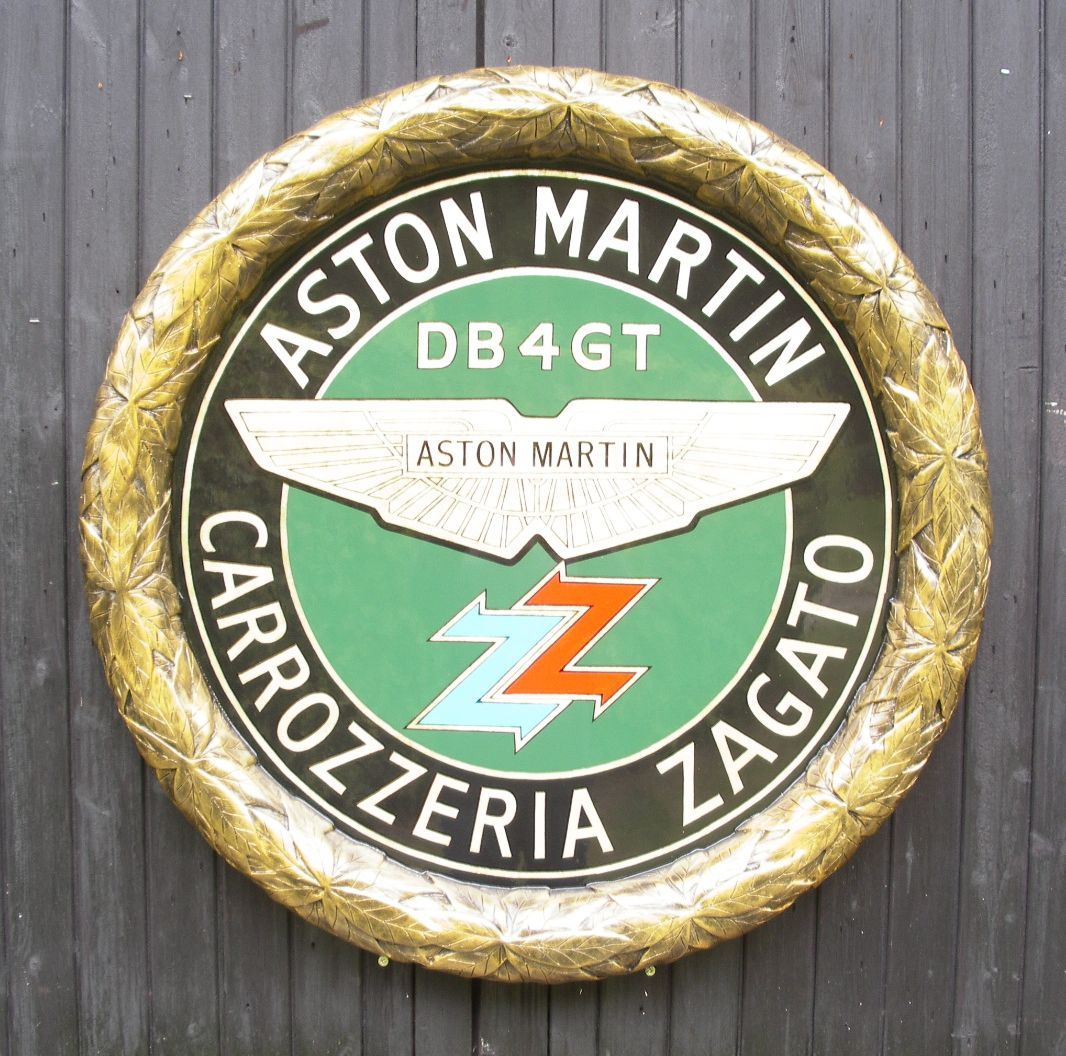 Bonhams Cars : A raised laurel leaf edged roundel featuring Corrosserie ...