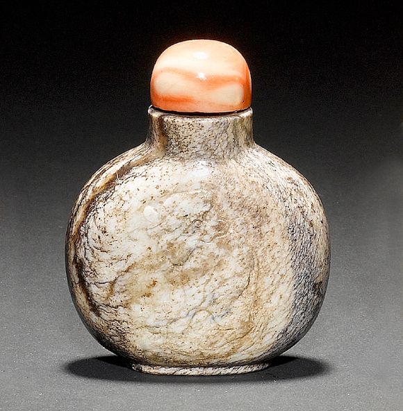Bonhams : A burnt jade snuff bottle; with stopper 18th/19th century