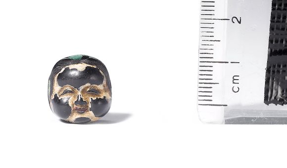 Bonhams : A lacquered wood Kyogen double-mask ojime By Ichikawa Tetsuro ...