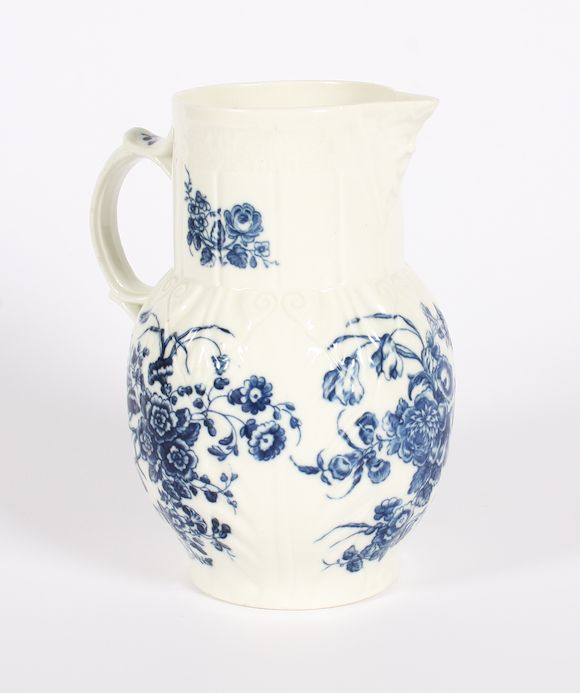 Bonhams : A Caughley cabbage leaf moulded mask jug Circa 1780-85.