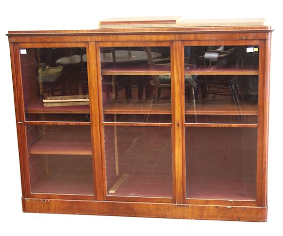 Bonhams : A Victorian mahogany three door glazed bookcase,
