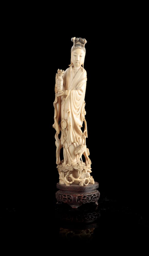 Bonhams : A carved ivory figure of a lady 19th century