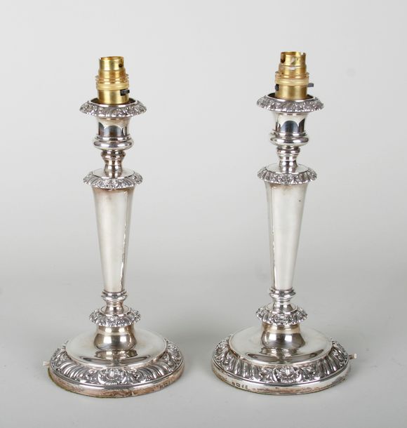 Bonhams : A pair of George IV silver candlesticks, converted to lamp ...
