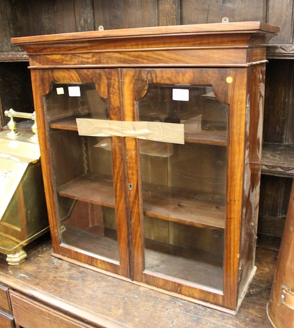 Bonhams : The upper section of a mid-Victorian walnut small bookcase,