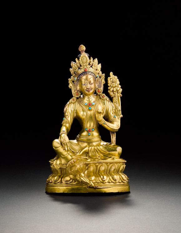 Bonhams : A gilt-bronze figure of Shyama Tara 18th century