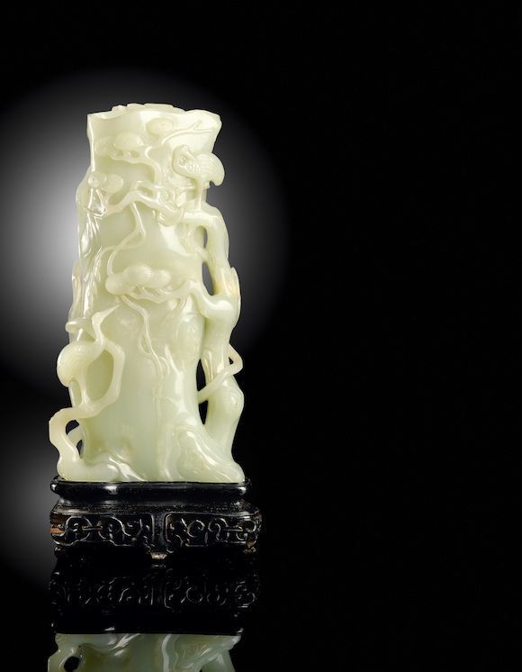Bonhams : A fine pale green jade 'pine' vase 18th century