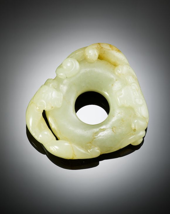 Bonhams : A white jade disc Ming dynasty