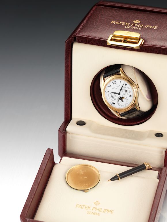 Bonhams : Patek Philippe. A fine 18ct gold automatic perpetual calendar ...