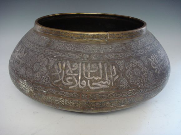 Bonhams : An large Islamic inlaid brass pot, Probably 19th century,