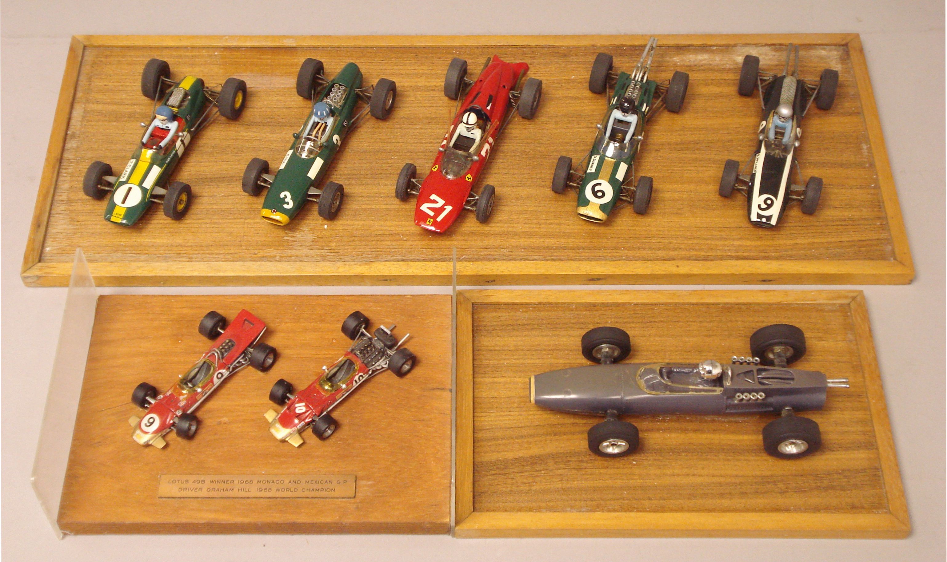 Bonhams Cars : Three displays of Graham Hill scale model race cars,