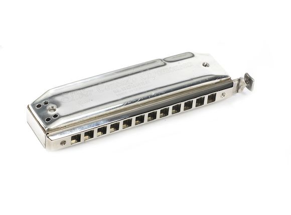 Bonhams : Larry Adler's silver concerto harmonica,