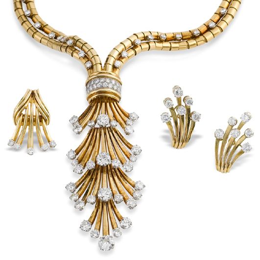 Bonhams : A gold and diamond necklace, pendant/clip and earring suite ...