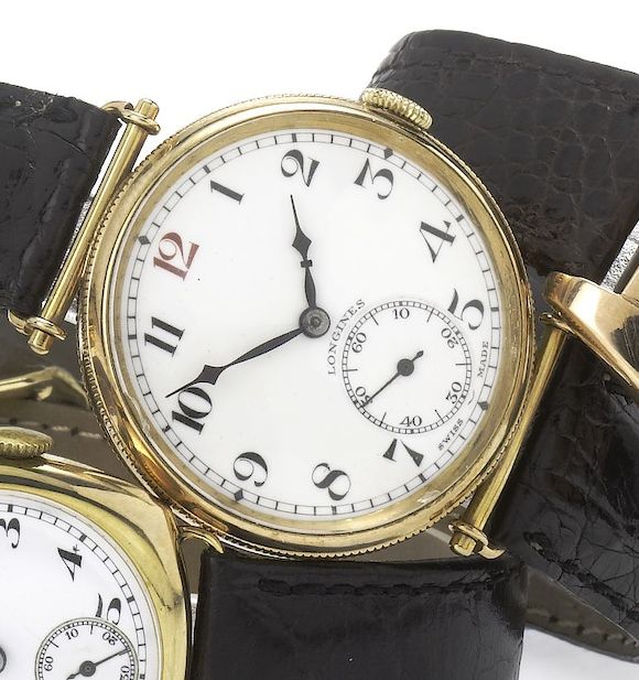 Bonhams : Longines. A fine 9ct gold enamel dial hinged lug wristwatch ...
