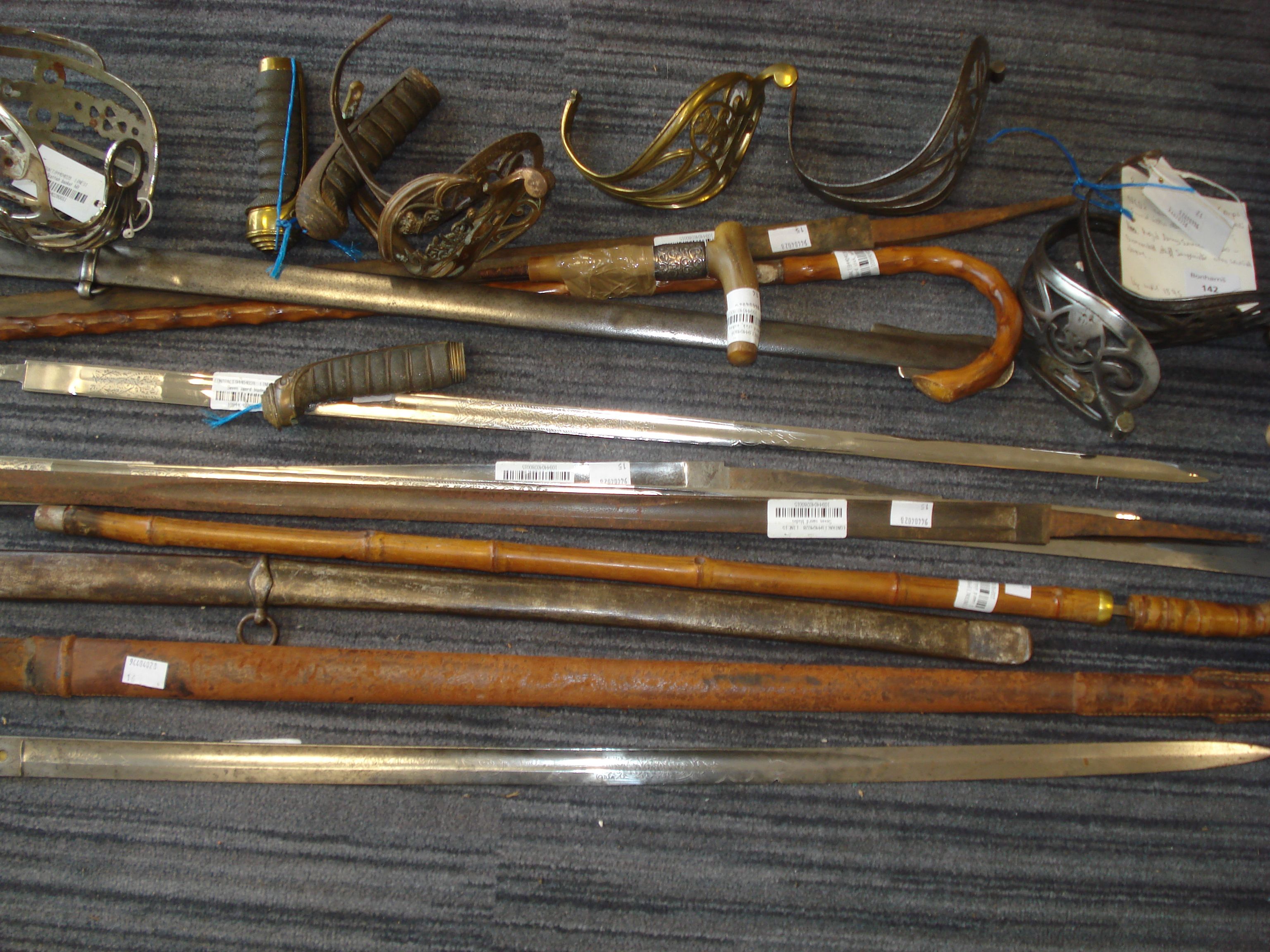 Three Scabbards, Three Sword Blades, and Five Damaged Swords - auctions ...