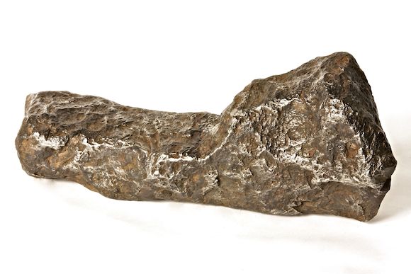 Bonhams : A hatchet shaped "muonionalusta" meteorite,