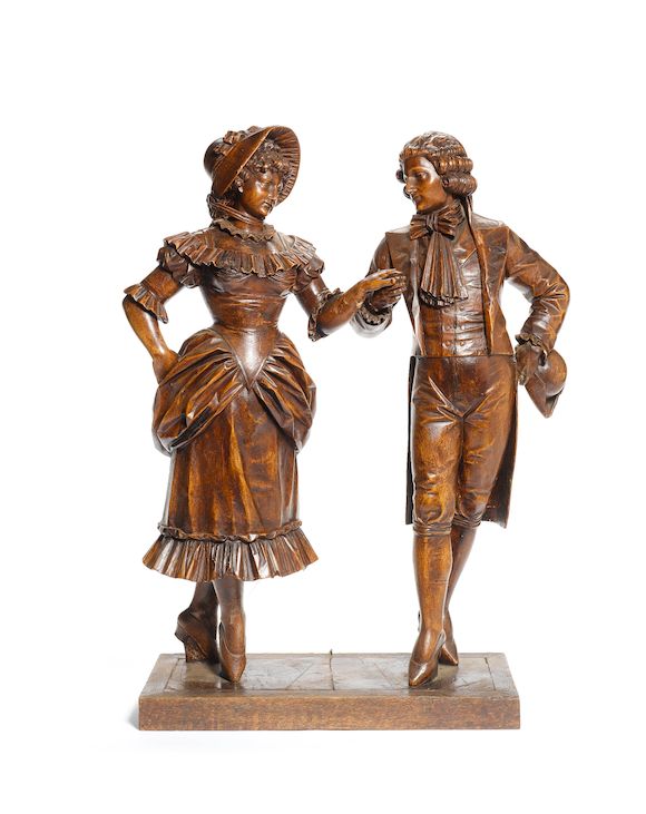 Bonhams : A pair of late 19th/early 20th century carved walnut figures ...