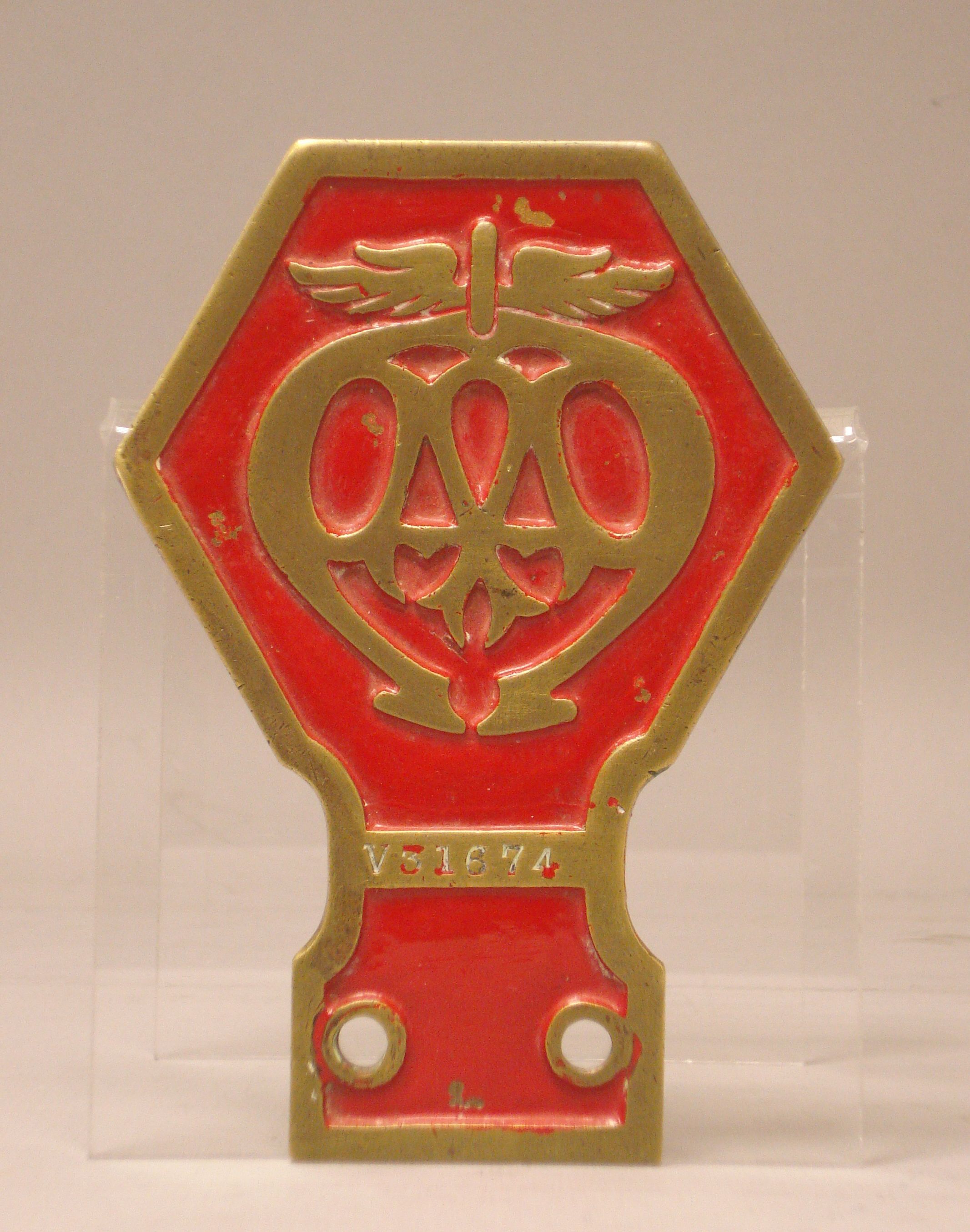 Bonhams Cars : An AA Commercial red-backed badge, 1911-1930