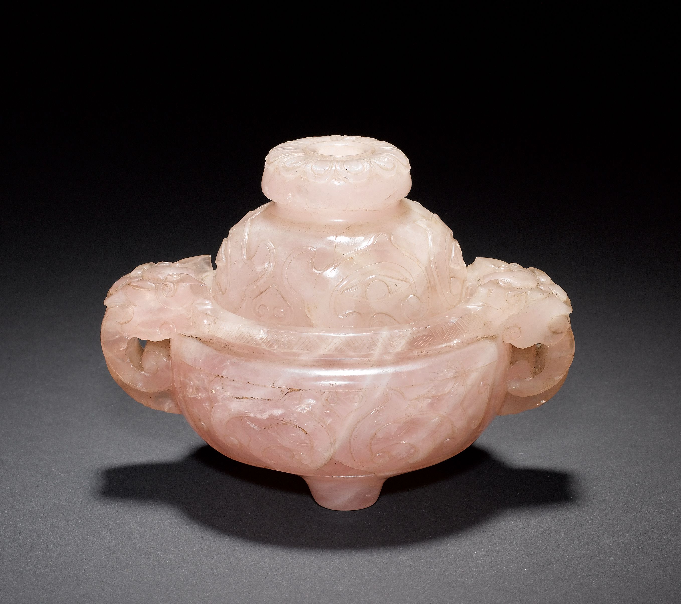 Bonhams : An elegant, mottled rose-quartz model of a guei with domed ...
