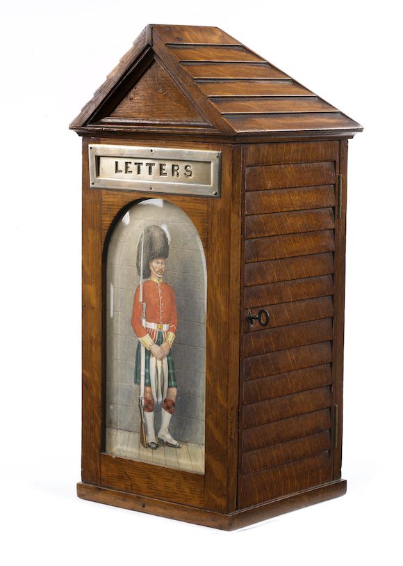 Bonhams : An oak 'Sentry Box' style letter box, English, circa 1890,