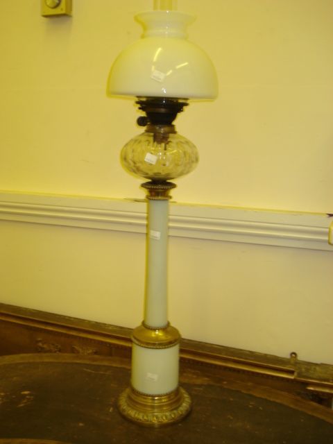 Bonhams : A Victorian opaline glass and brass column table lamp, the ...