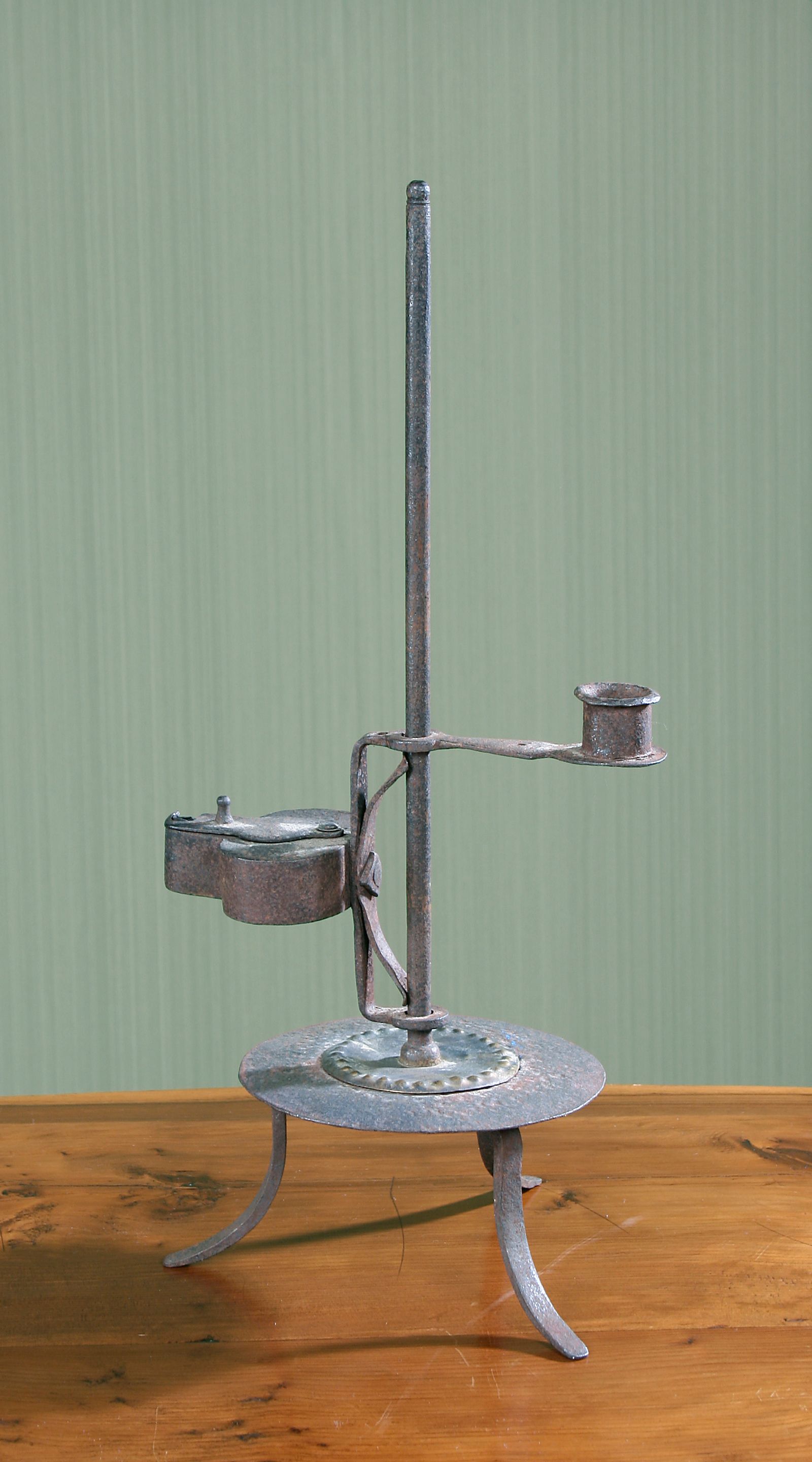 Bonhams : A 19th Century wrought iron 'Betty' lamp