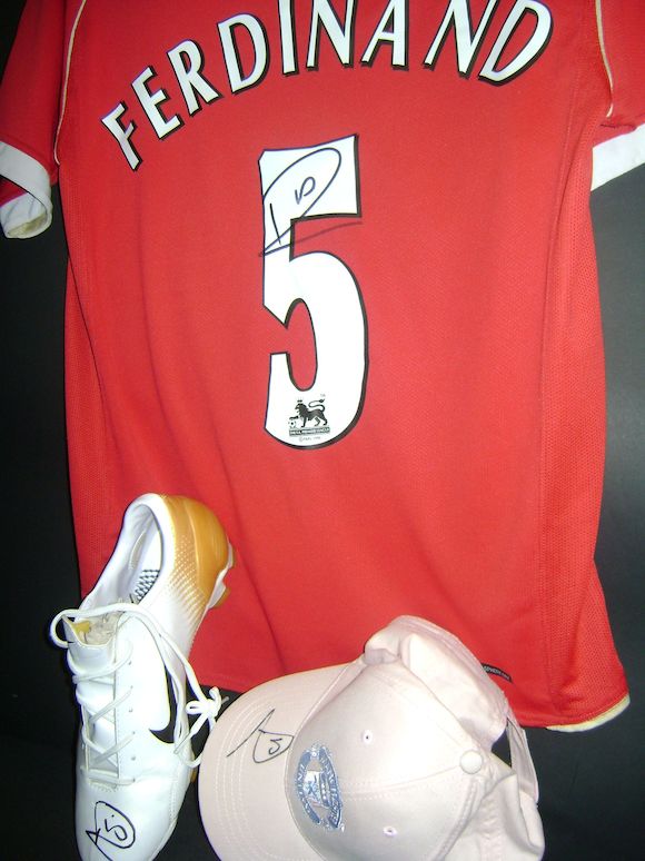 Bonhams : Rio Ferdinand hand signed replica shirt, boot and baseball cap