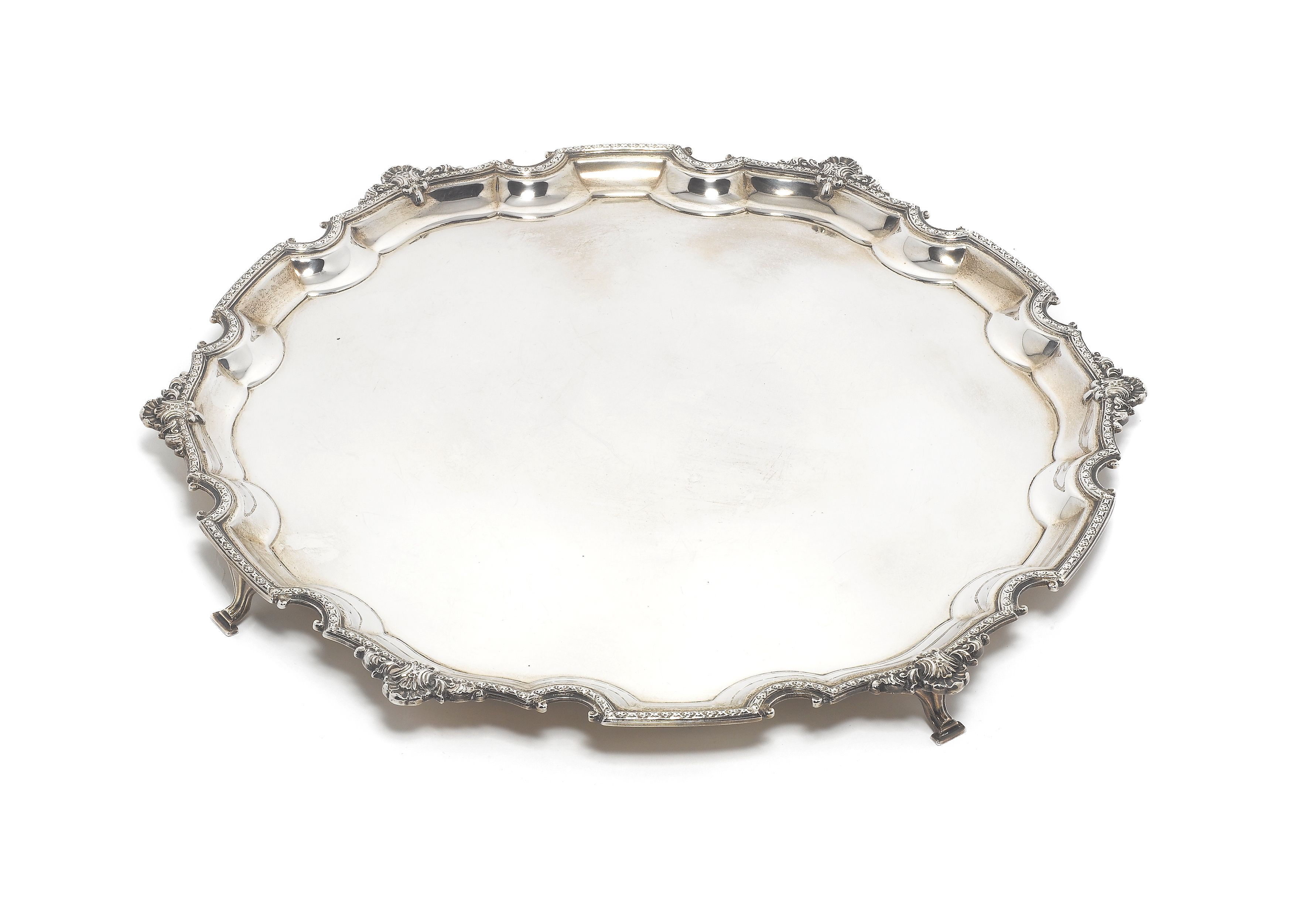 Bonhams : A silver shaped-circular salver, by A. E. Poston & Co. Ltd ...